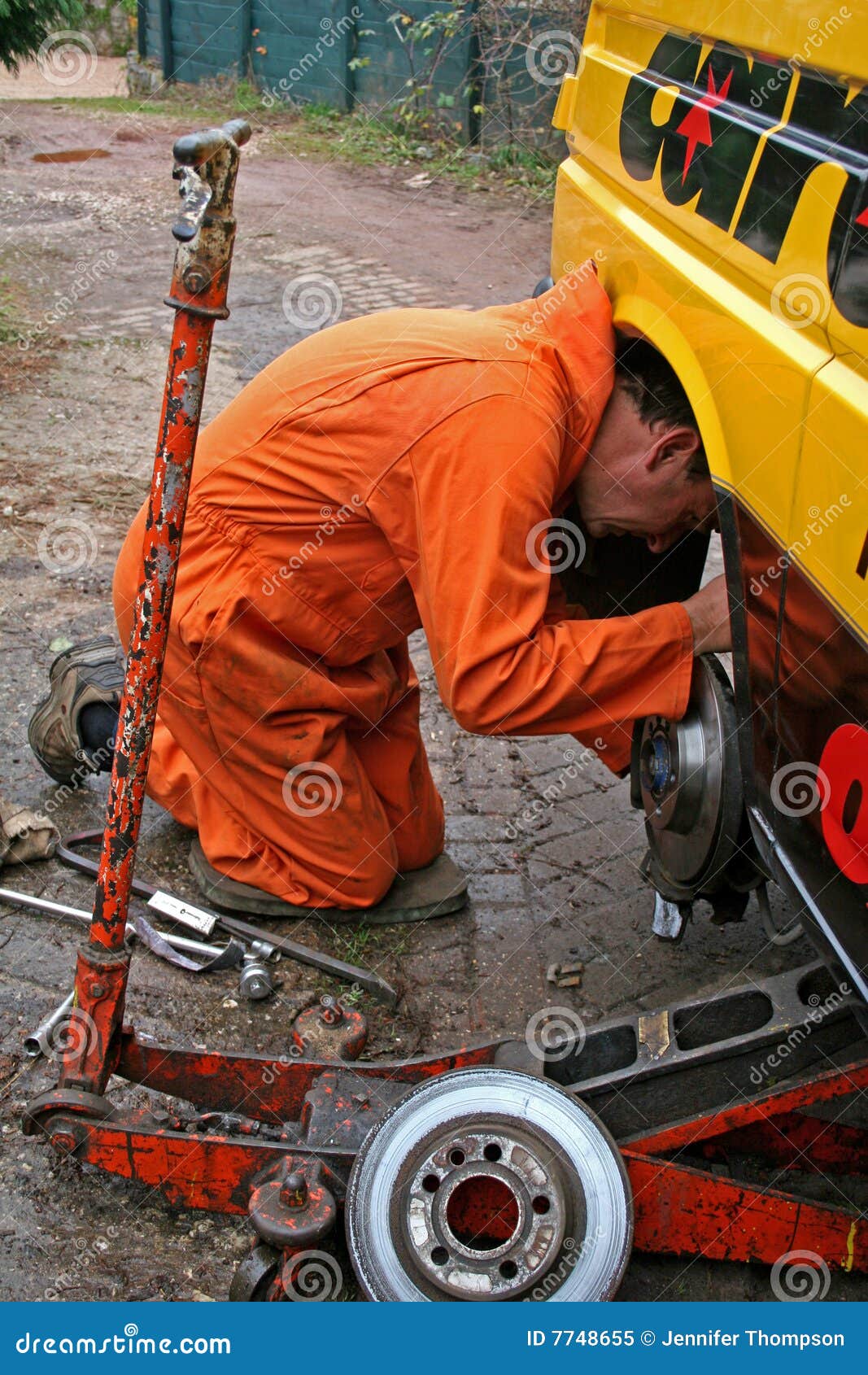Mechanic Changing Brake Disc Picture. Image: 7748655