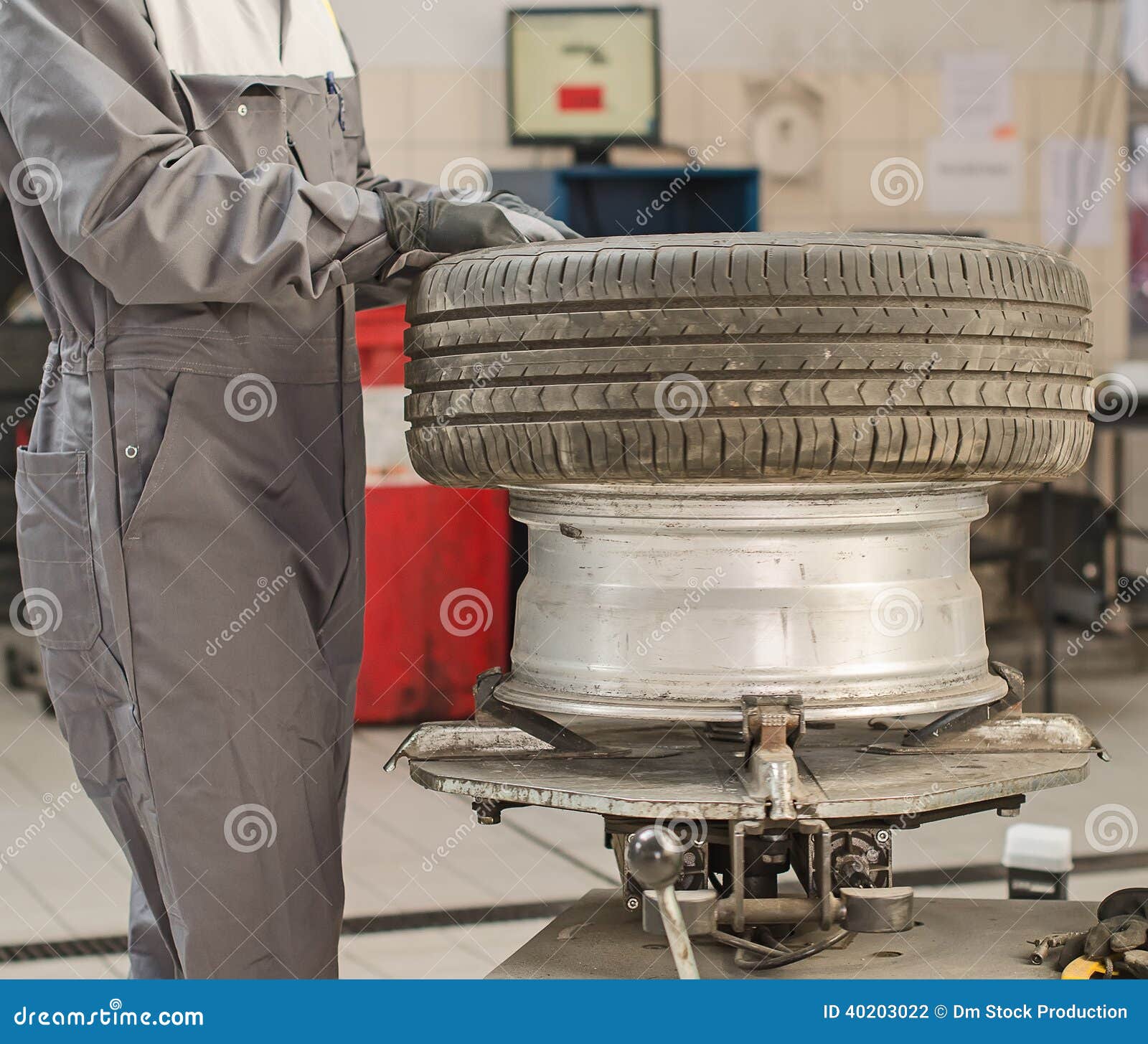 Mechanic Changing Car Tire. Stock Photo - Image of manual, pneumatic ...