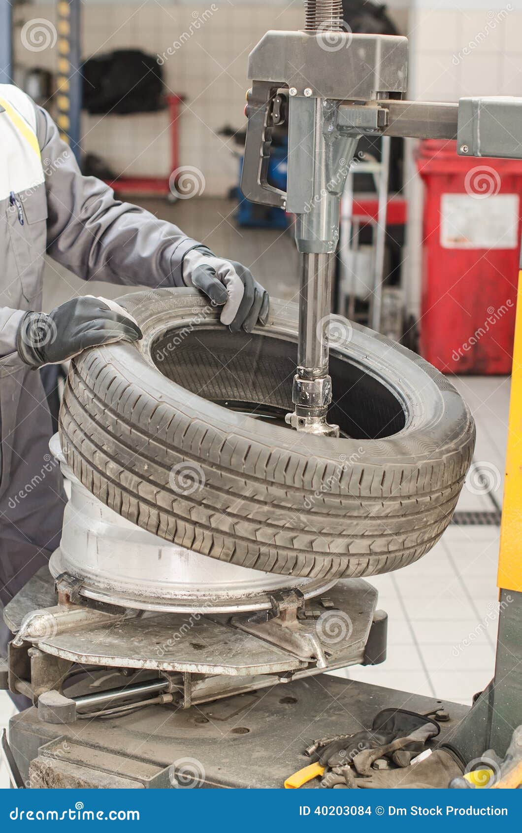 Mechanic Changing Car Tire. Stock Photo - Image of pneumatic, auto ...