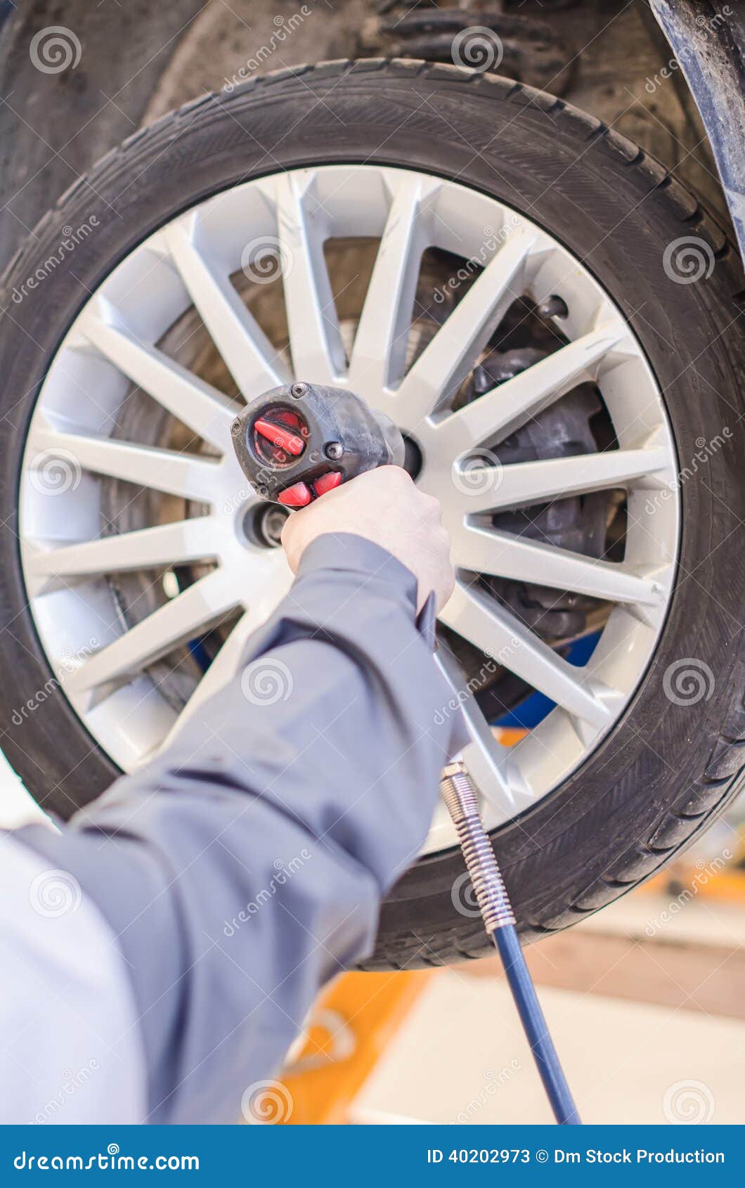 Mechanic Changing Car Wheel. Stock Image - Image of garage, manual ...