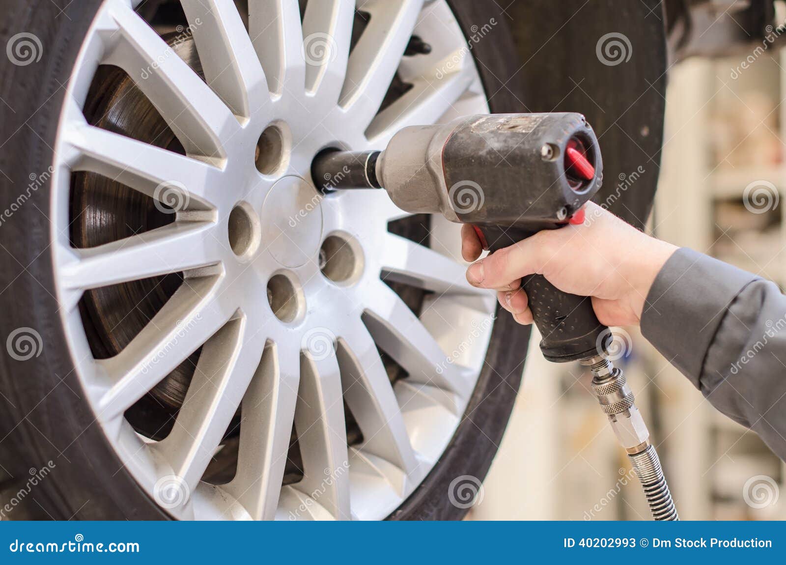 Mechanic Changing Car Wheel. Stock Image - Image of occupation ...