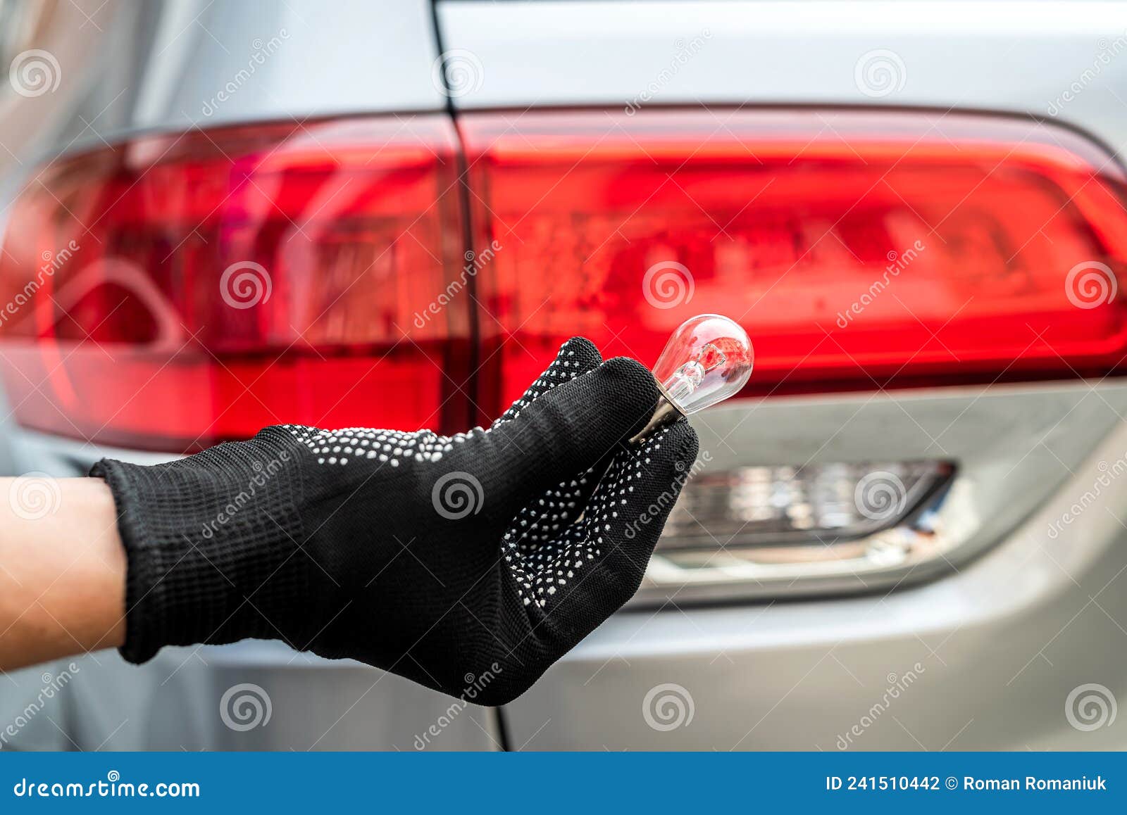 Mechanic Changing Light Bulb in His Car Stock Photo - Image of glass ...