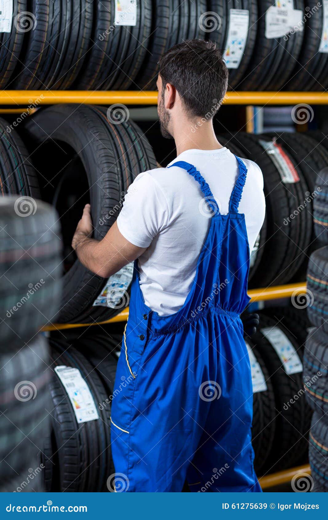 Mechanic Check a New Tire for Car Stock Image - Image of looking ...