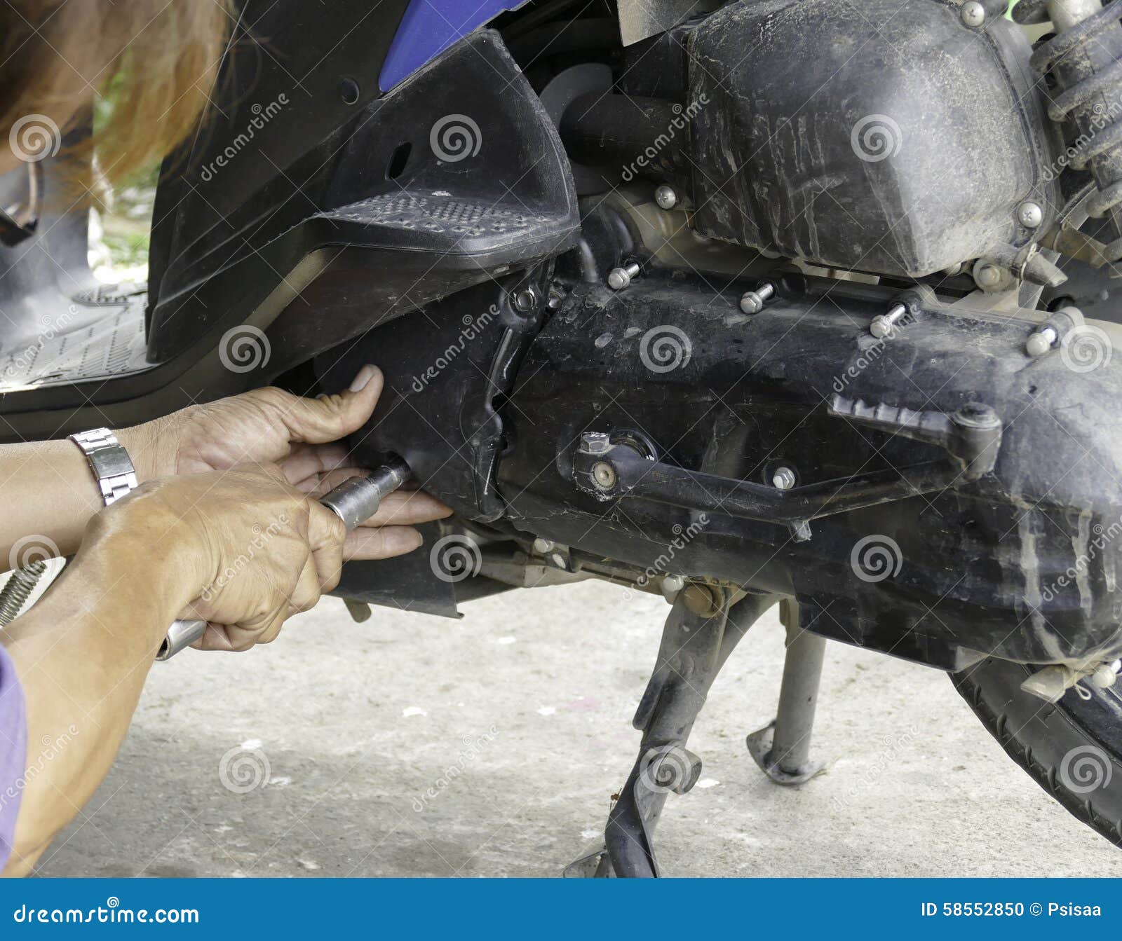 The Mechanic Check the Pulley and Belt of Motorcycle Stock Photo ...