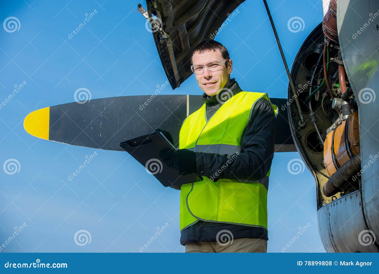 Mechanic Checking Airplane S Engine Stock Photo - Image of quality ...