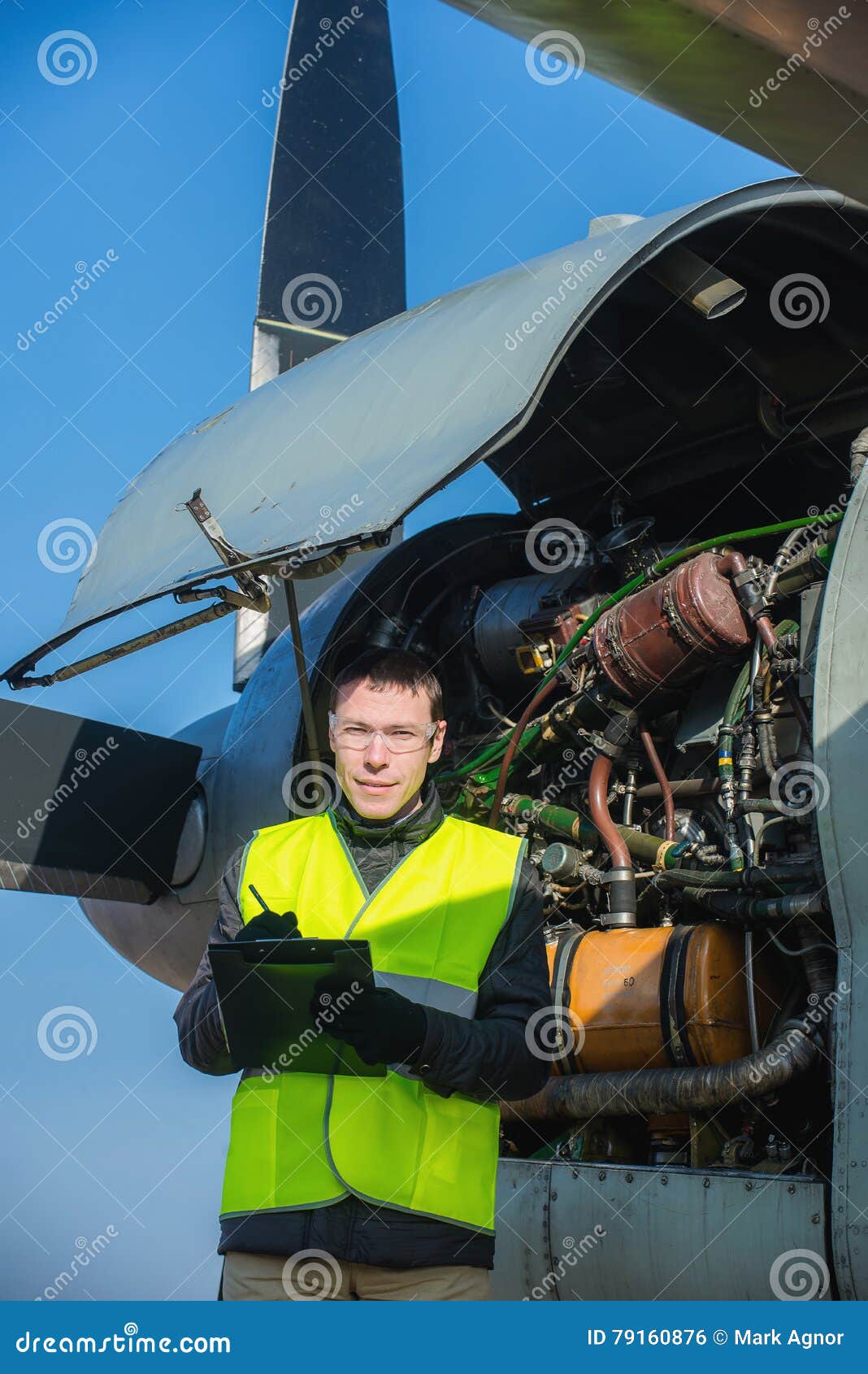 Mechanic Checking Airplane S Engine Stock Photo - Image of cargo ...