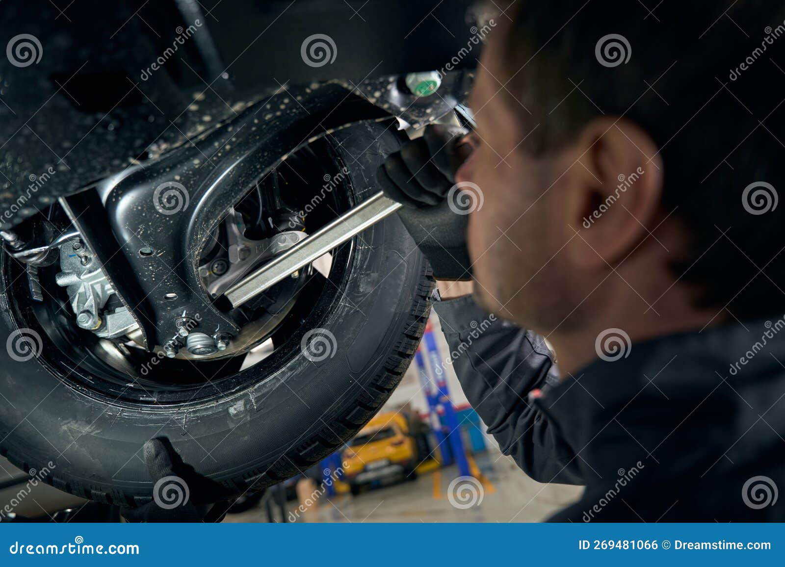 Mechanic Checking Boot Collars in the Workshop Stock Photo - Image of ...