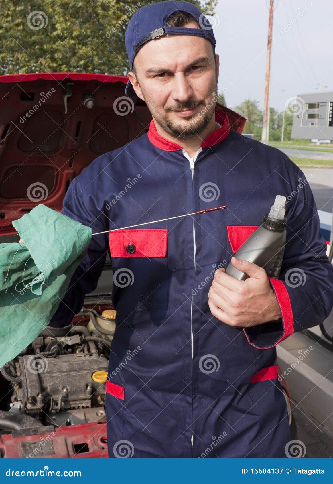 Mechanic Checking Engine stock image. Image of lubricant - 16604137
