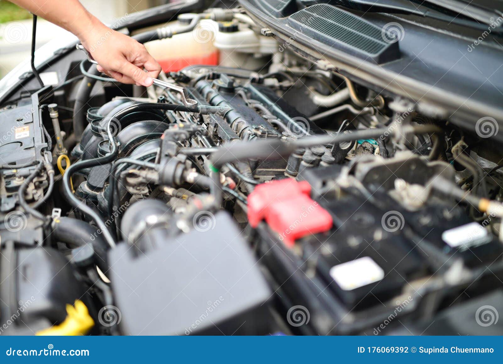Mechanic is Checking the Engine before Delivering To the Customer ...