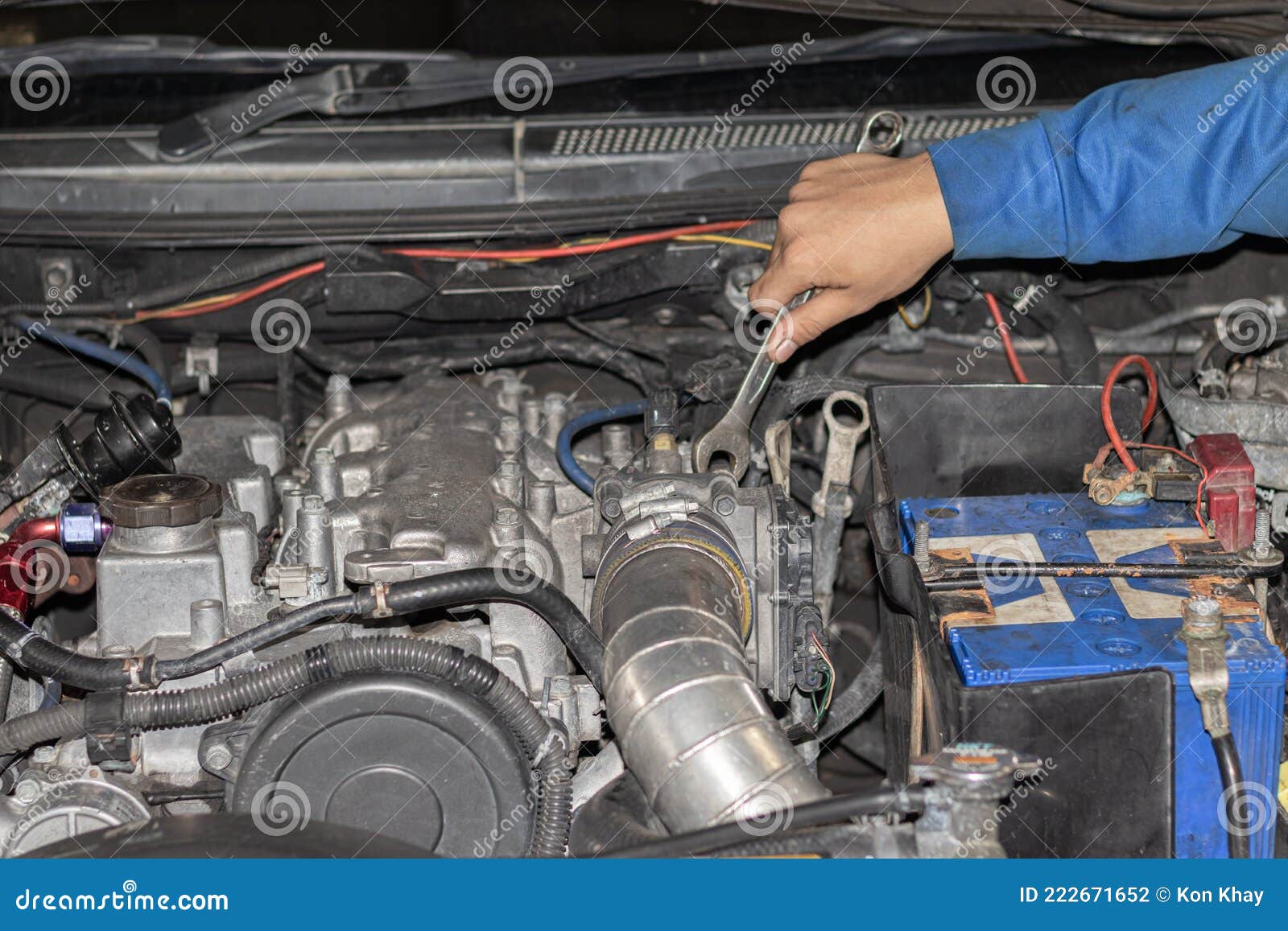 The Mechanic is Checking the Engine. Stock Photo - Image of industry ...