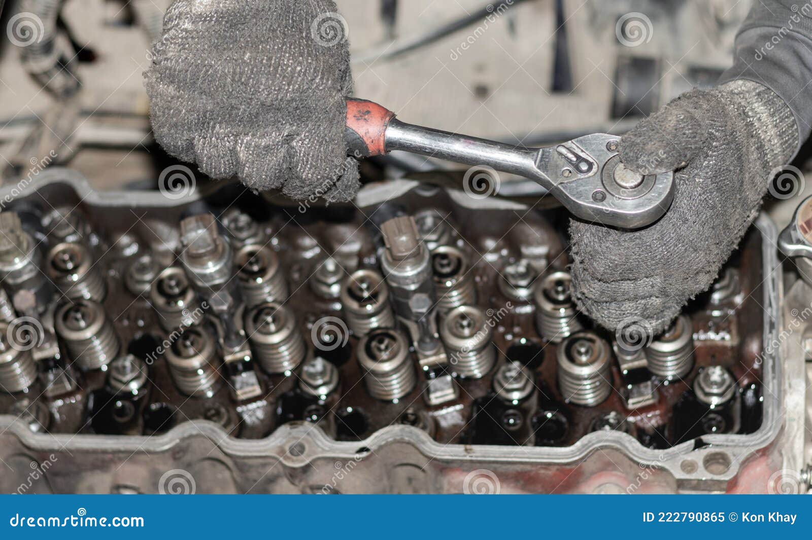 The Mechanic is Checking the Engine. the Mechanic is Checking the ...