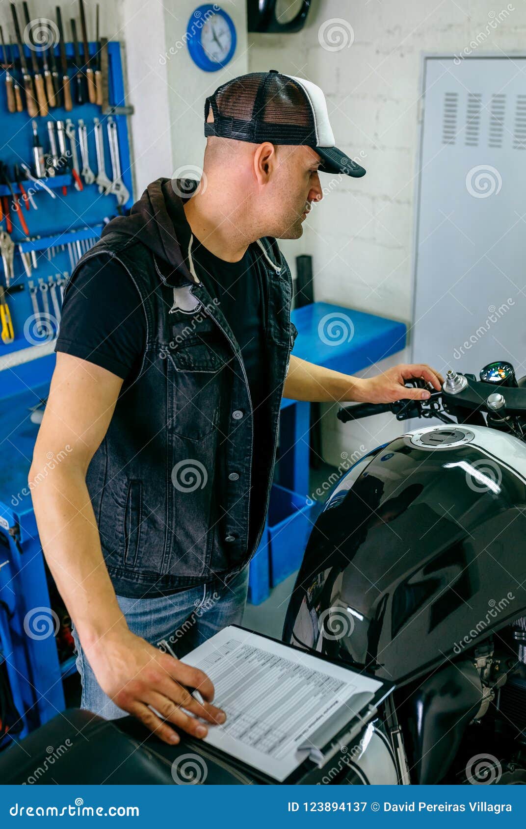 Mechanic Checking Motorcycle Stock Image - Image of repair, custom ...