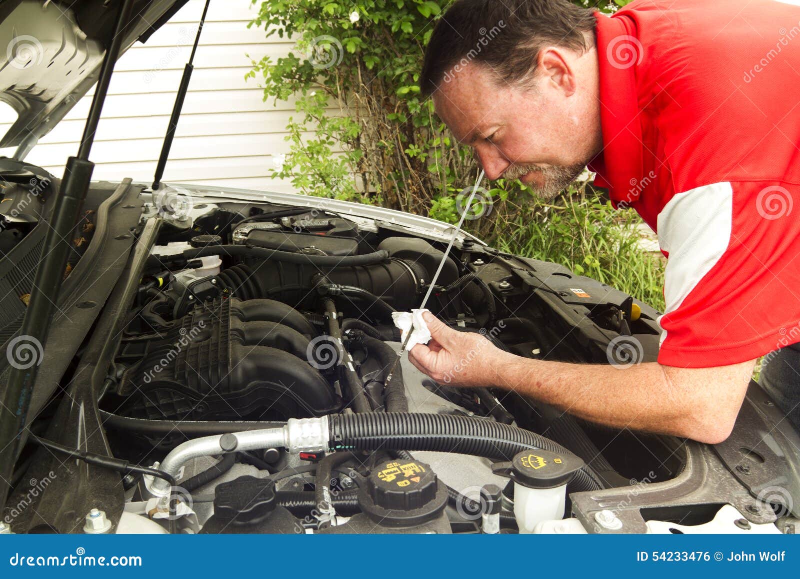 Mechanic Checking Engine Royalty-Free Stock Photo | CartoonDealer.com ...