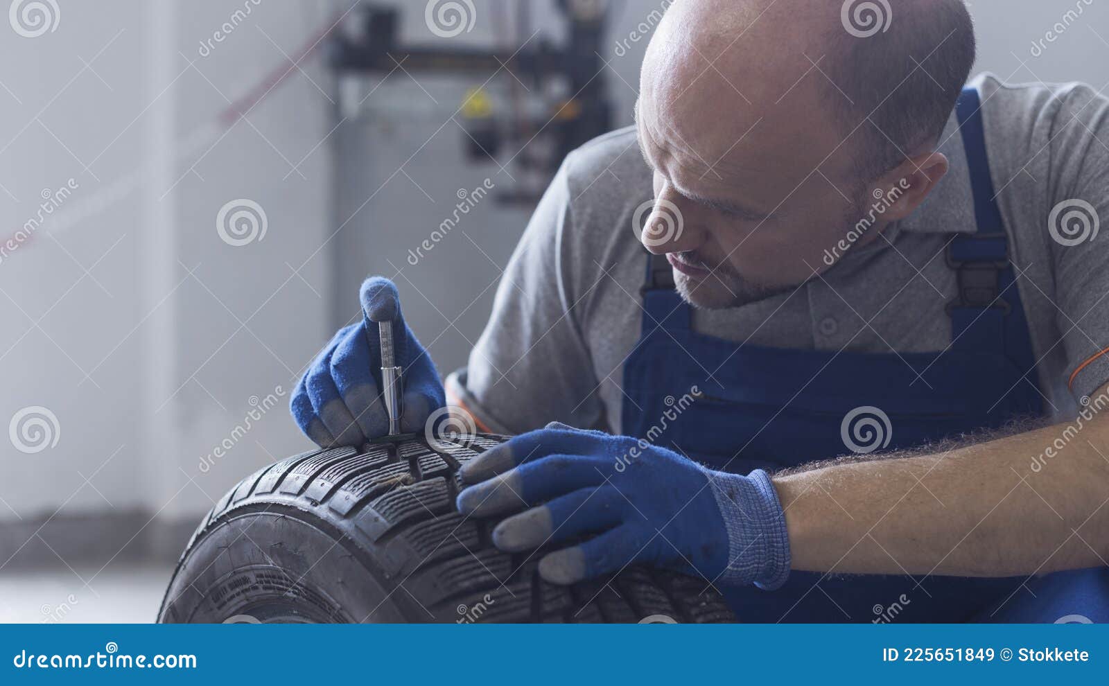 Mechanic Checking Tire Tread Depth and Wear Stock Image - Image of ... Mechanic Checking Tire Tread Depth and Wear Stock Image - Image of ...