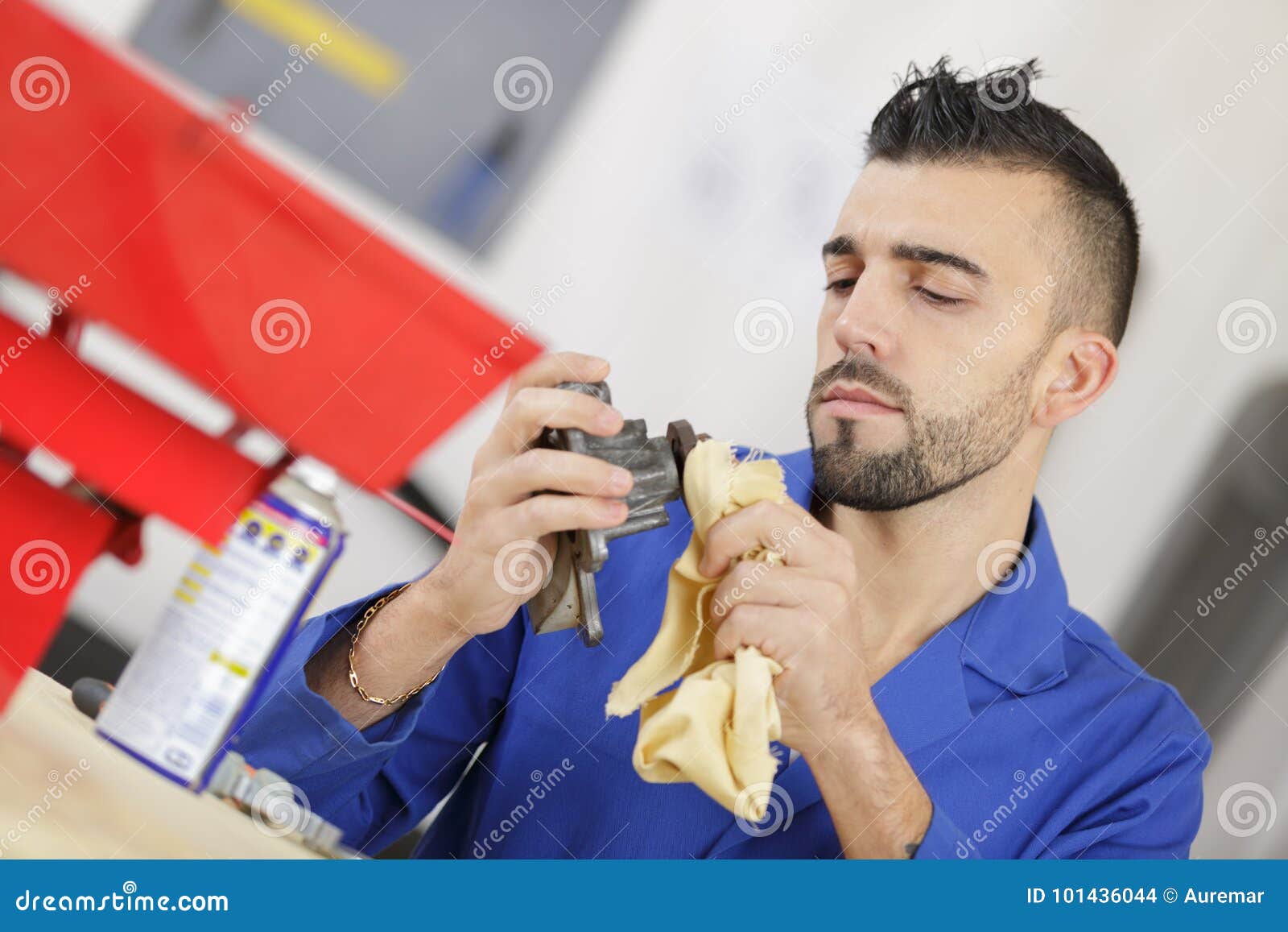 Mechanic Cleaning Gear Piece Stock Photo - Image of heavy, machine ...