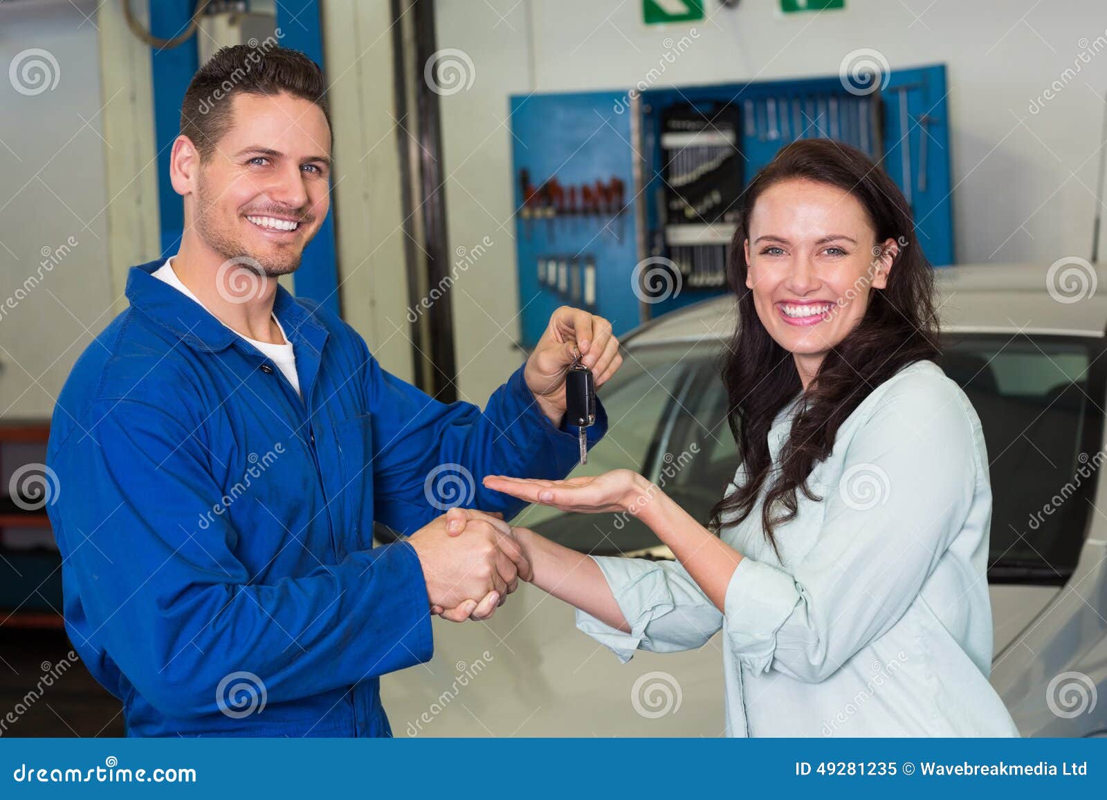 Mechanic and Customer Smiling at Camera Stock Image - Image of garage ...