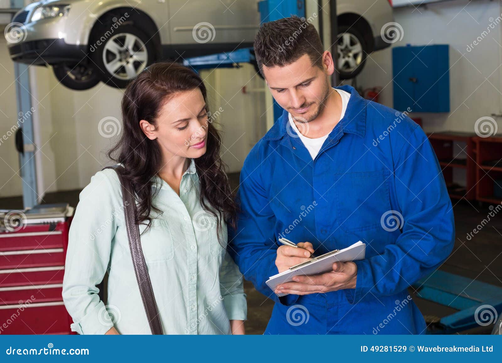 Mechanic and Customer Talking Together Stock Image - Image of ...