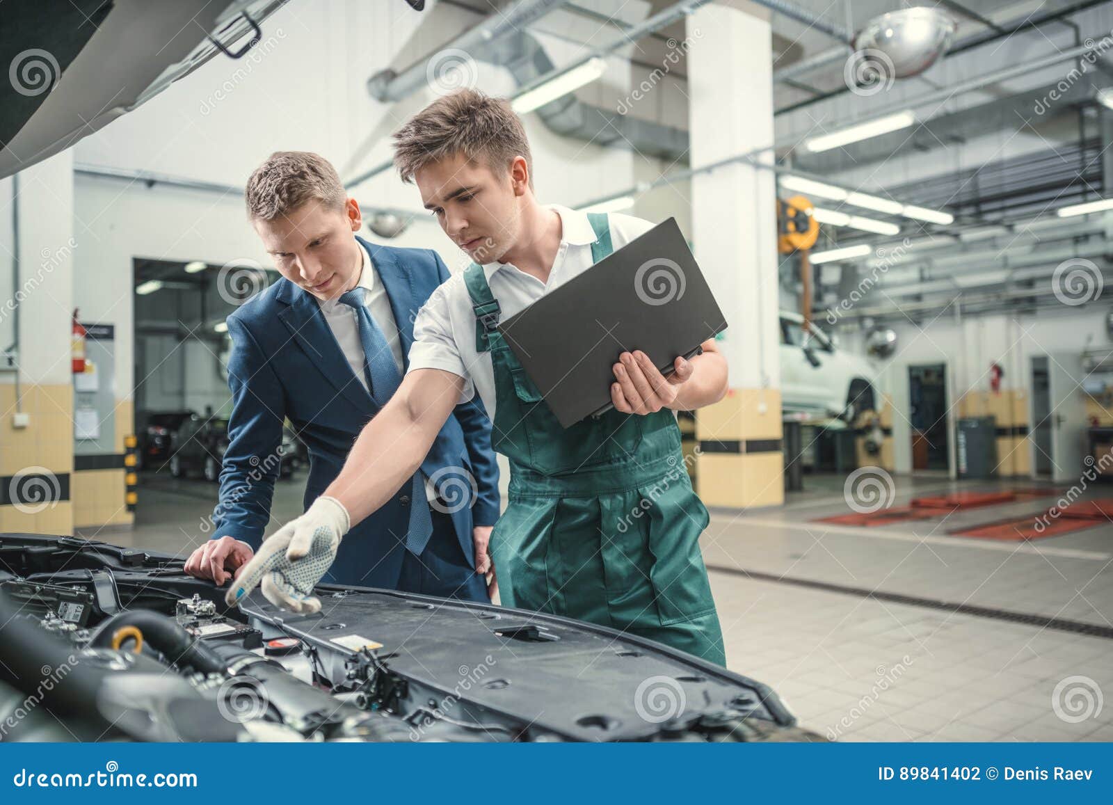 Mechanic and customer stock photo. Image of person, manager - 89841402