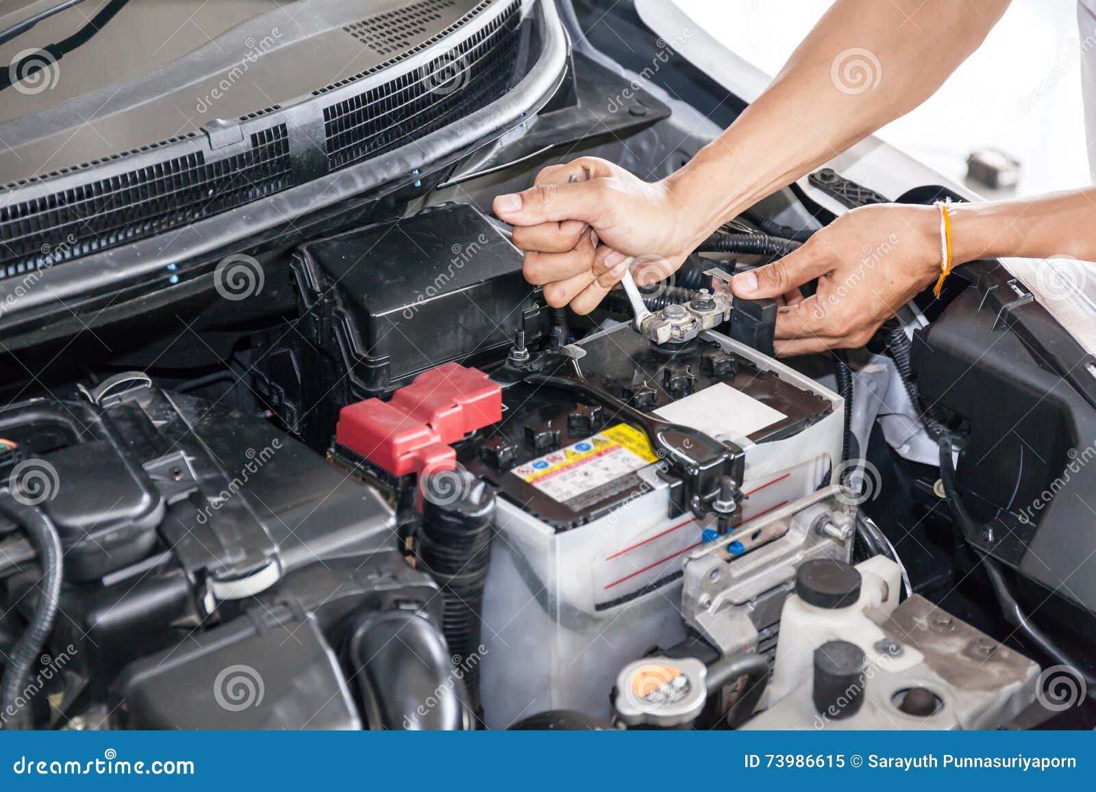 Mechanic Engineer Fixing Car Battery in Garage (selective Focus) Stock ...