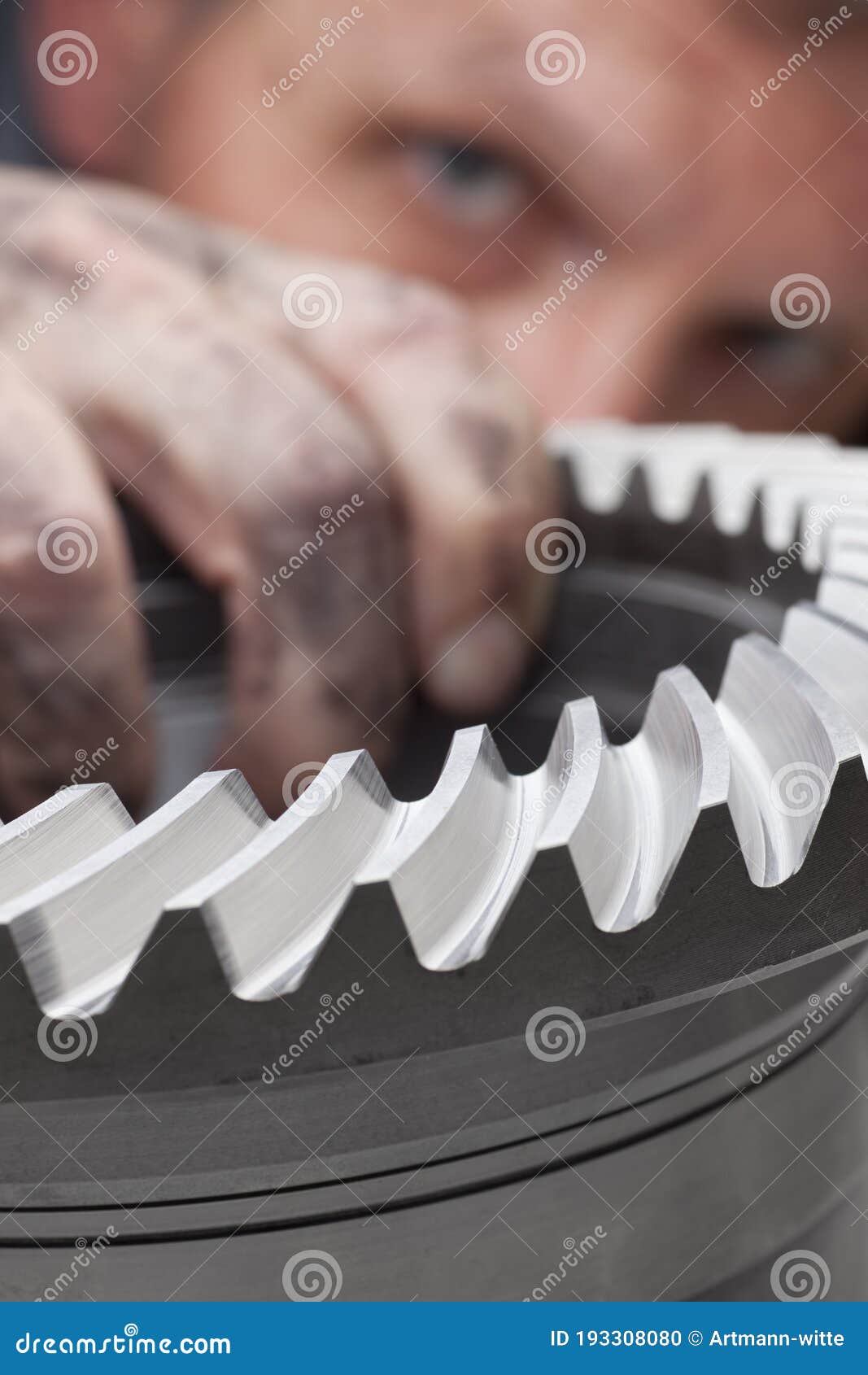 Mechanic Examining a Spare Part - Cog Wheel Stock Photo - Image of ...