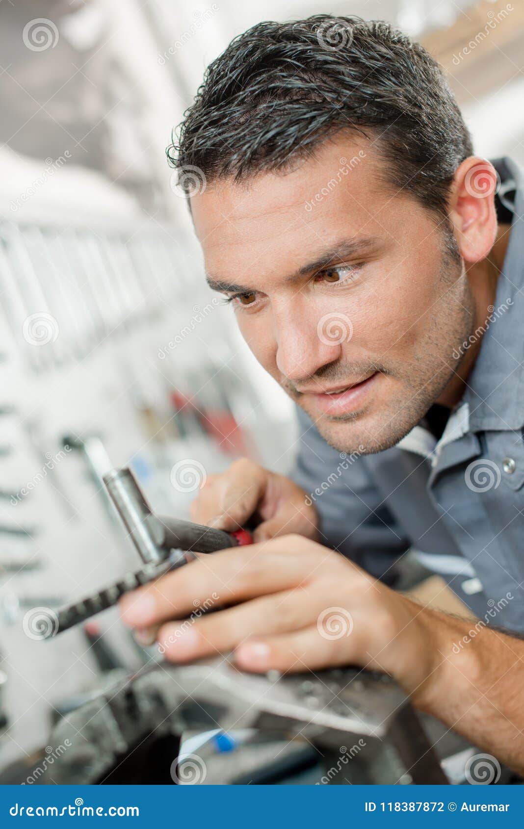 Mechanic filing metal part stock photo. Image of scrape - 118387872