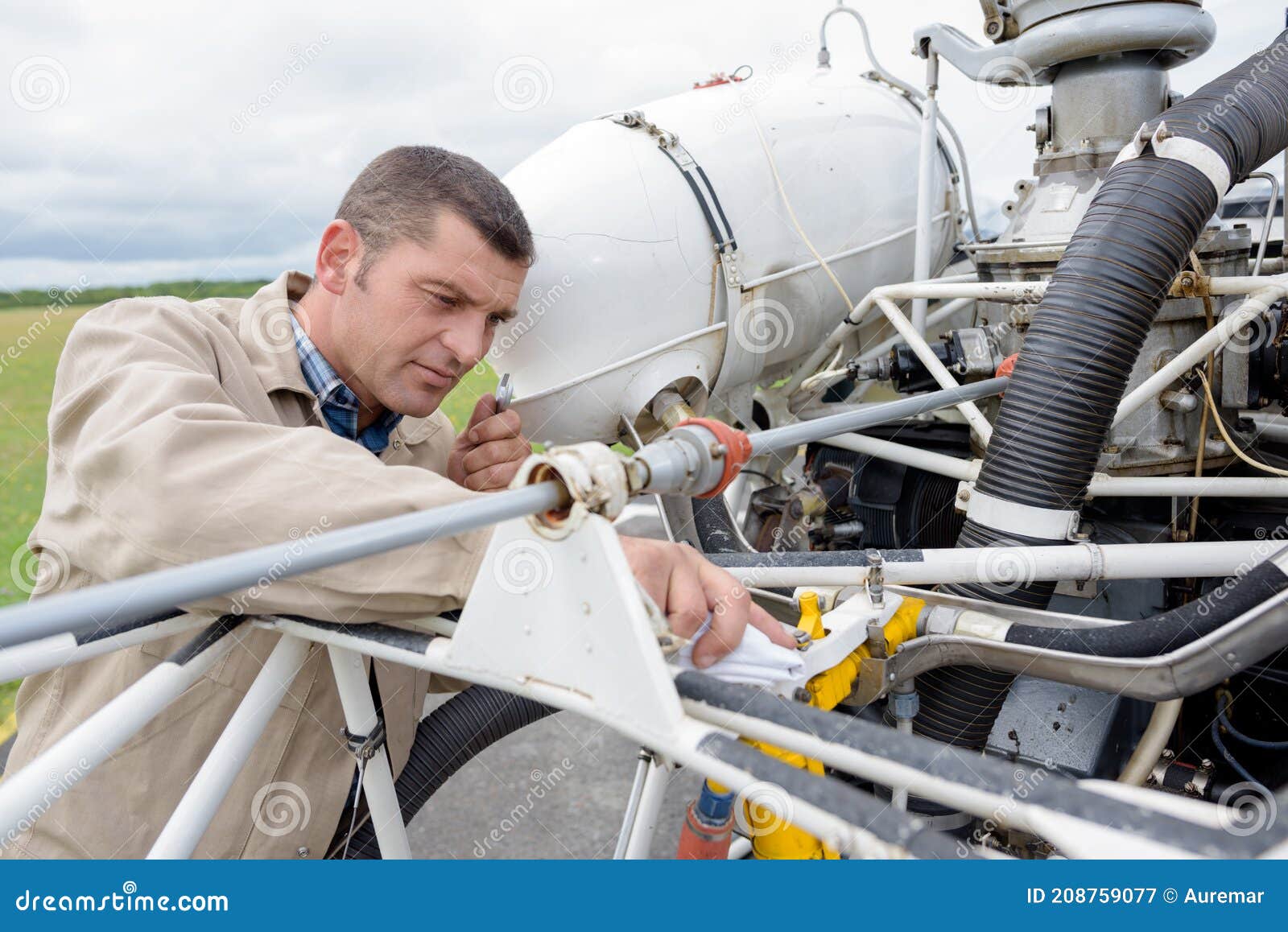 Mechanic Fixing Airplane Outdoors Stock Image - Image of service ...