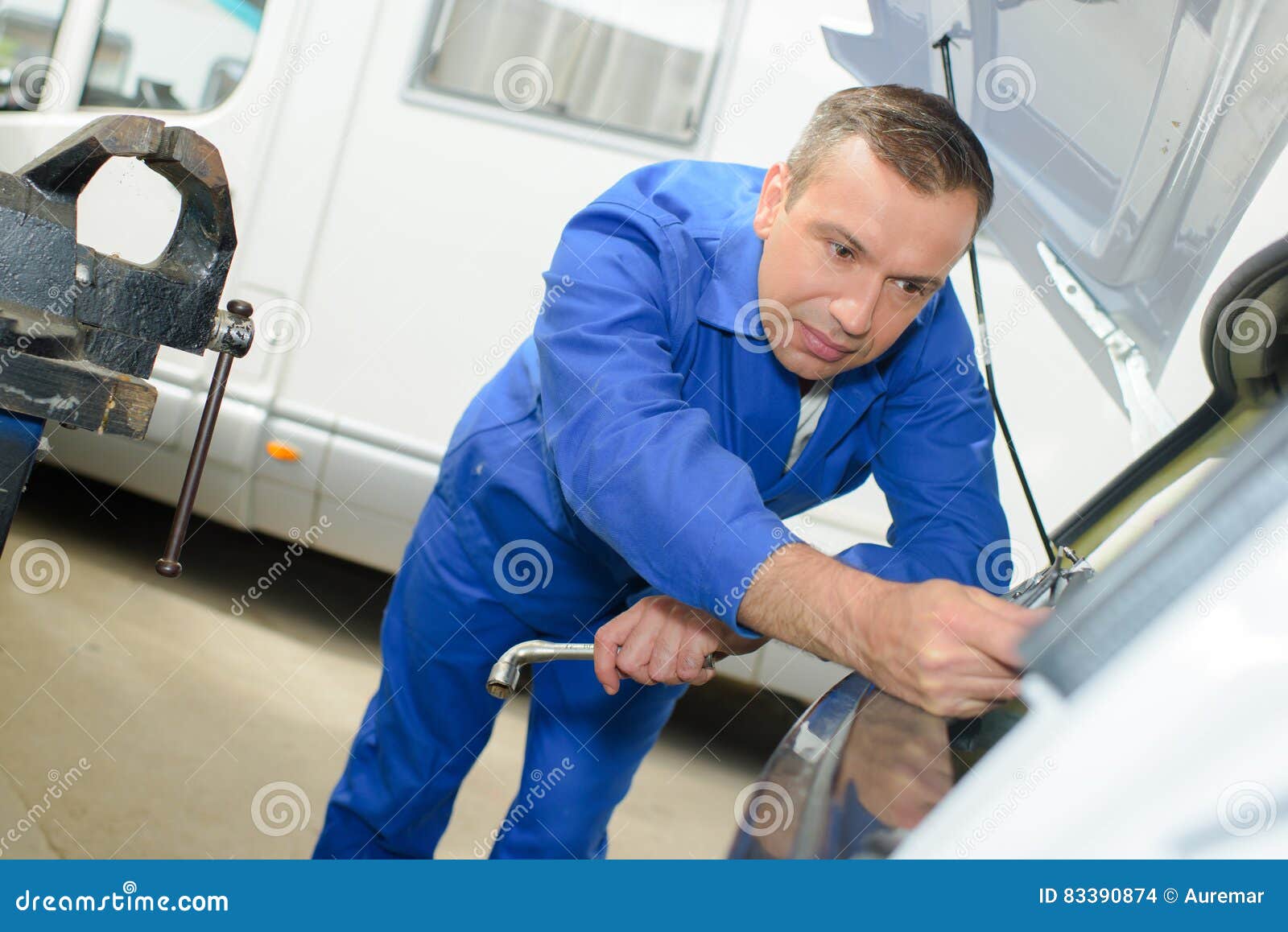 Mechanic fixing camper van stock photo. Image of fixing - 83390874