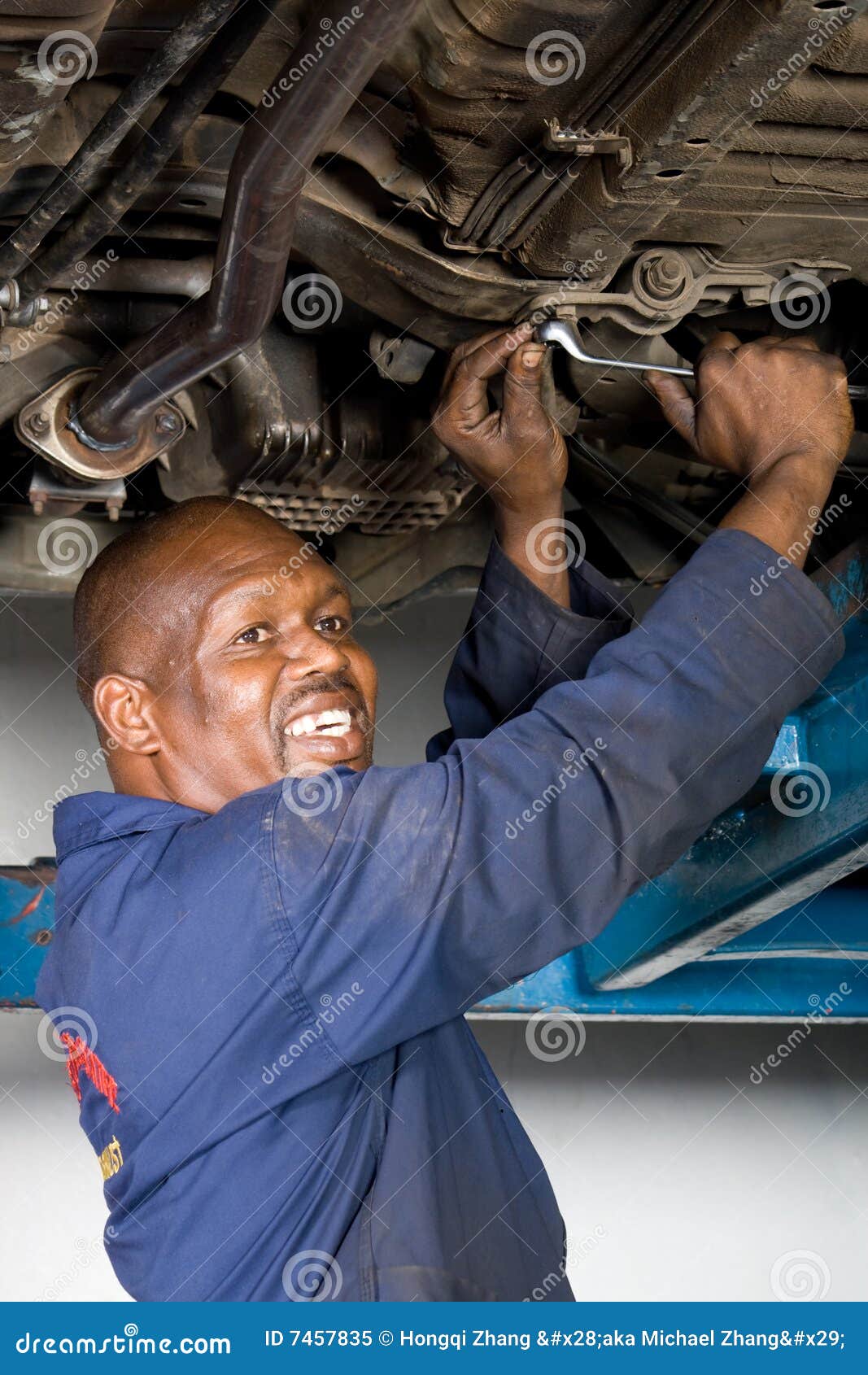Mechanic fixing car stock image. Image of lunch, person - 7457835