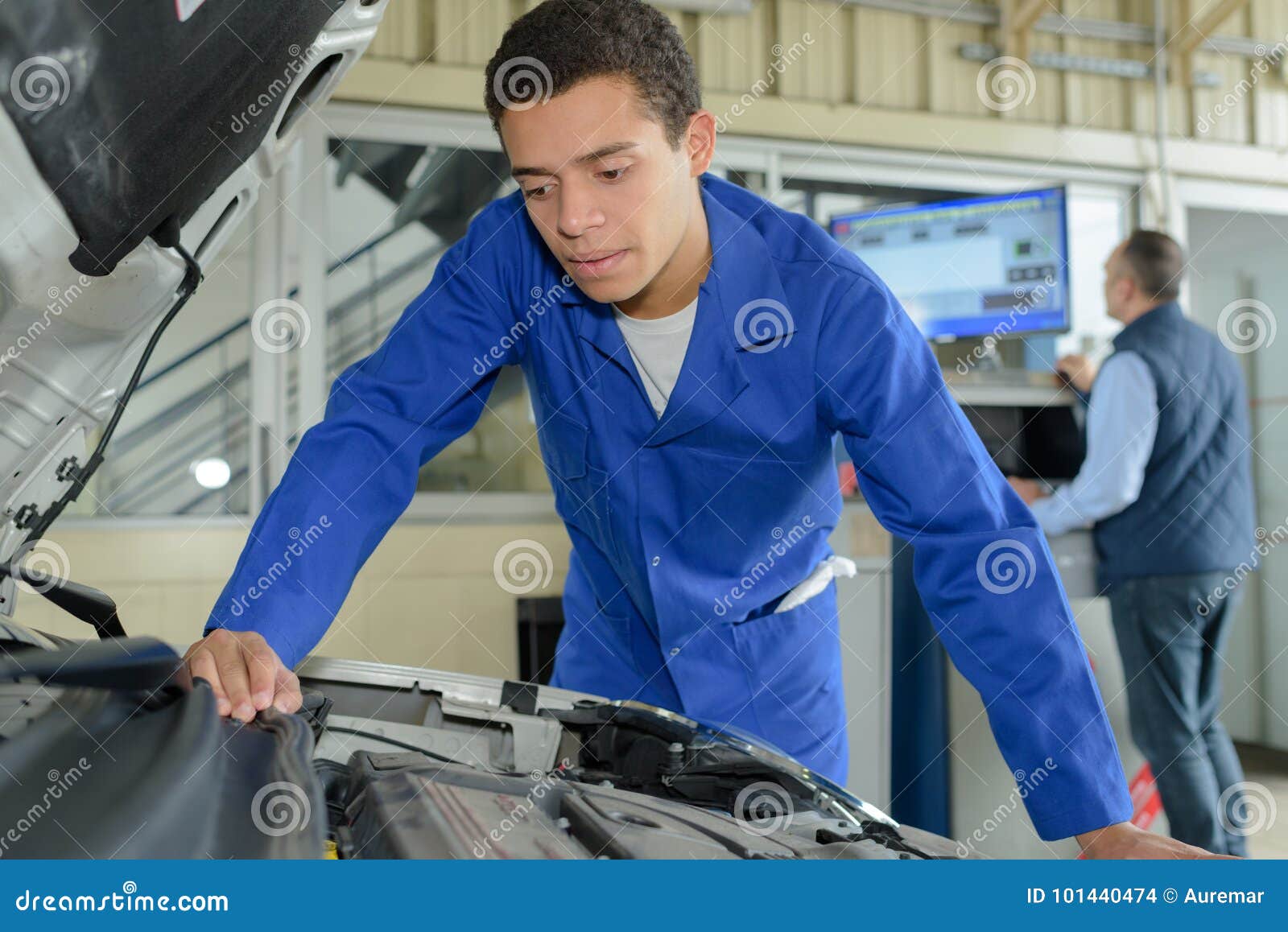 Mechanic Fixing Car Engine in Garage Stock Photo - Image of open, shop ...