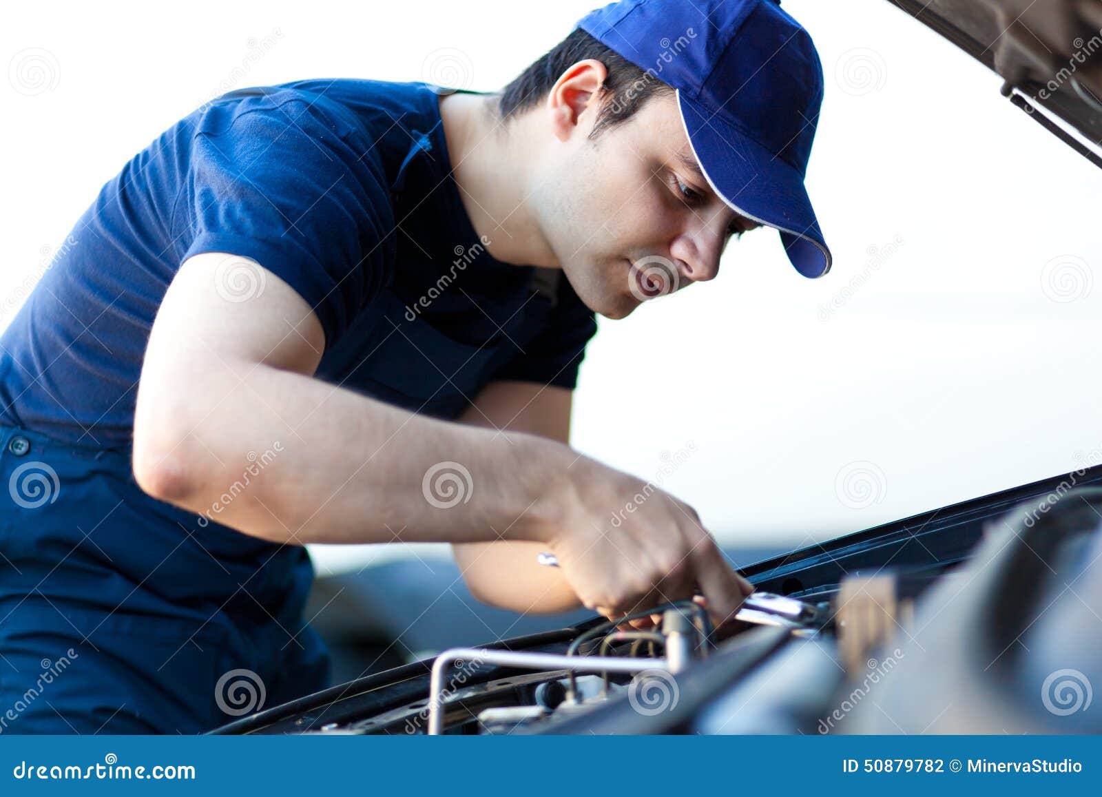 Mechanic Fixing a Car Engine Stock Photo - Image of motor, business ...