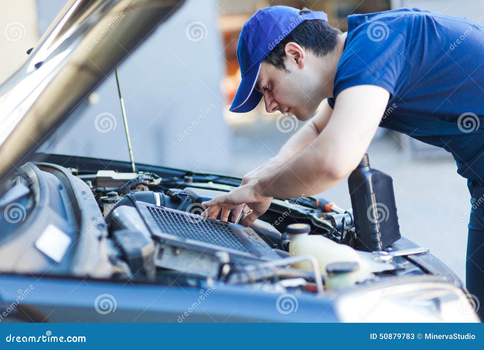 Mechanic Fixing a Car Engine Stock Image - Image of workshop ...