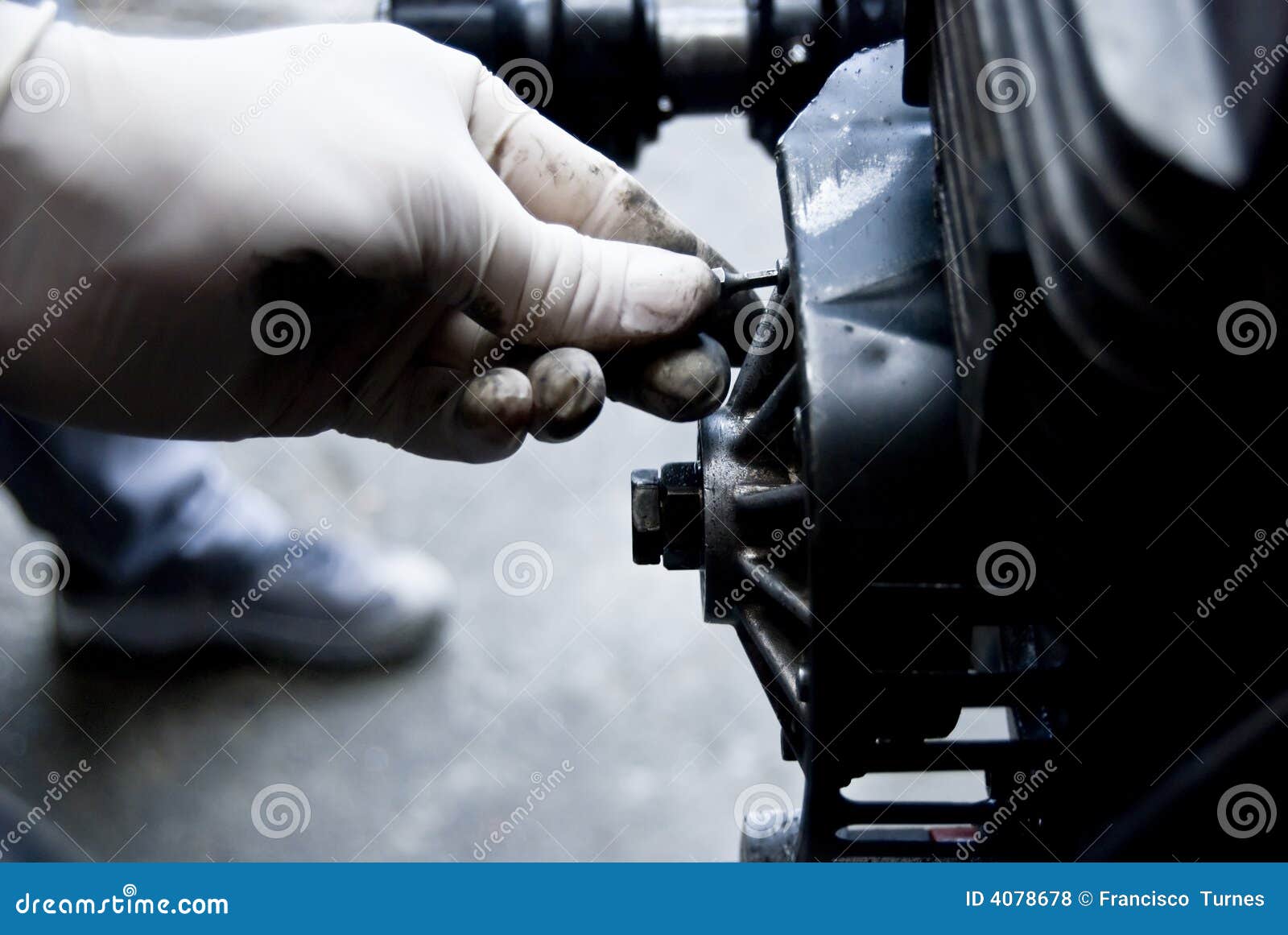 Mechanic fixing an engine stock photo. Image of combustion - 4078678
