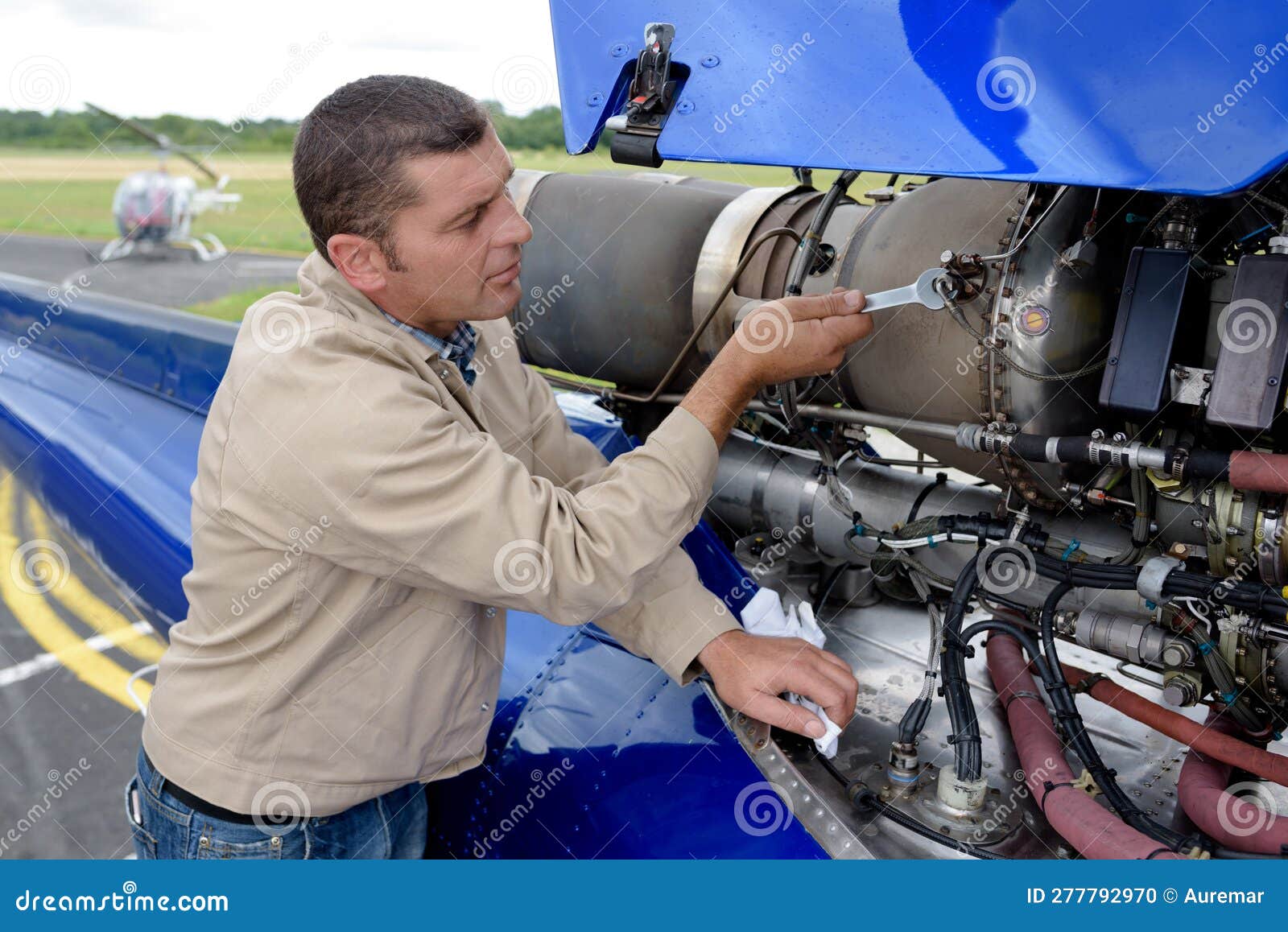 Mechanic Fixing Motor Plane Stock Photo - Image of club, technology ...
