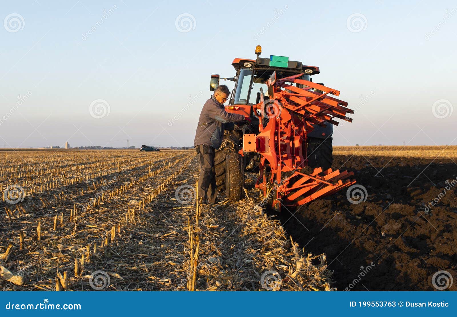 Mechanic Fixing Plow on the Tractor Stock Image - Image of fixing, plow ...