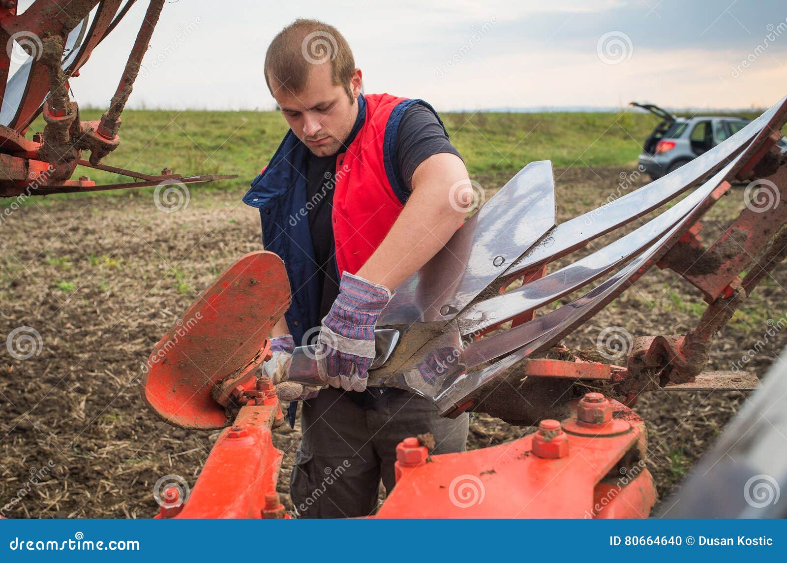 Mechanic Fixing Plow on the Tractor Stock Photo - Image of agriculture ...