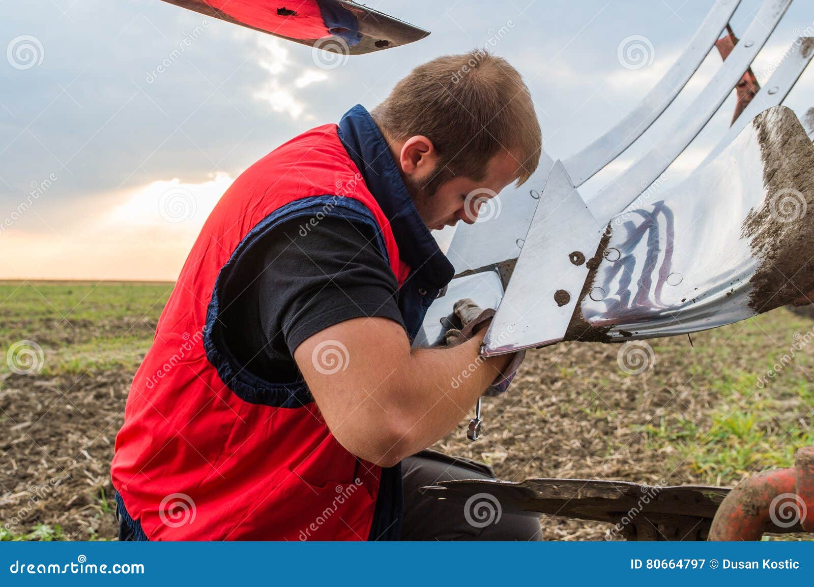 Mechanic Fixing Plow on the Tractor Stock Image - Image of security ...