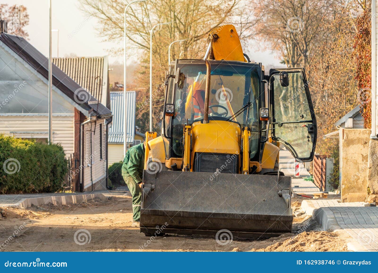 Mechanic Fixing Something on the Tractor Stock Photo - Image of ...