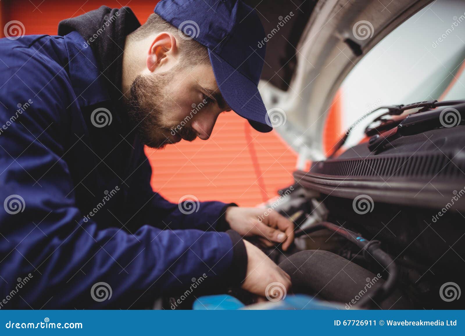 Mechanic fixing a van stock image. Image of attentively - 67726911
