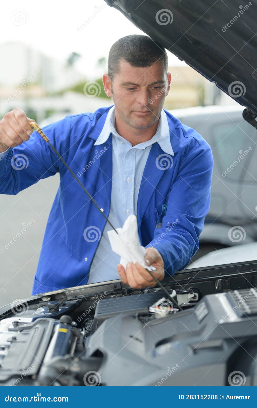 Mechanic Hand Checking Oil Level Stock Photo - Image of technology ...