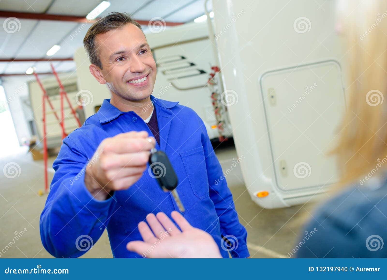 Mechanic Handing Key To Client Stock Photo - Image of client, purchase ...