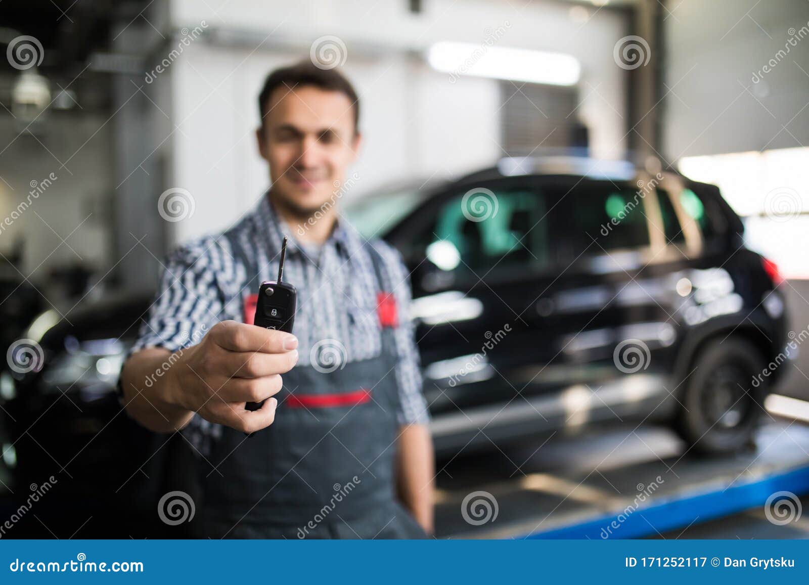Mechanic Handling Keys of a Car at the Service Garage Stock Image ...