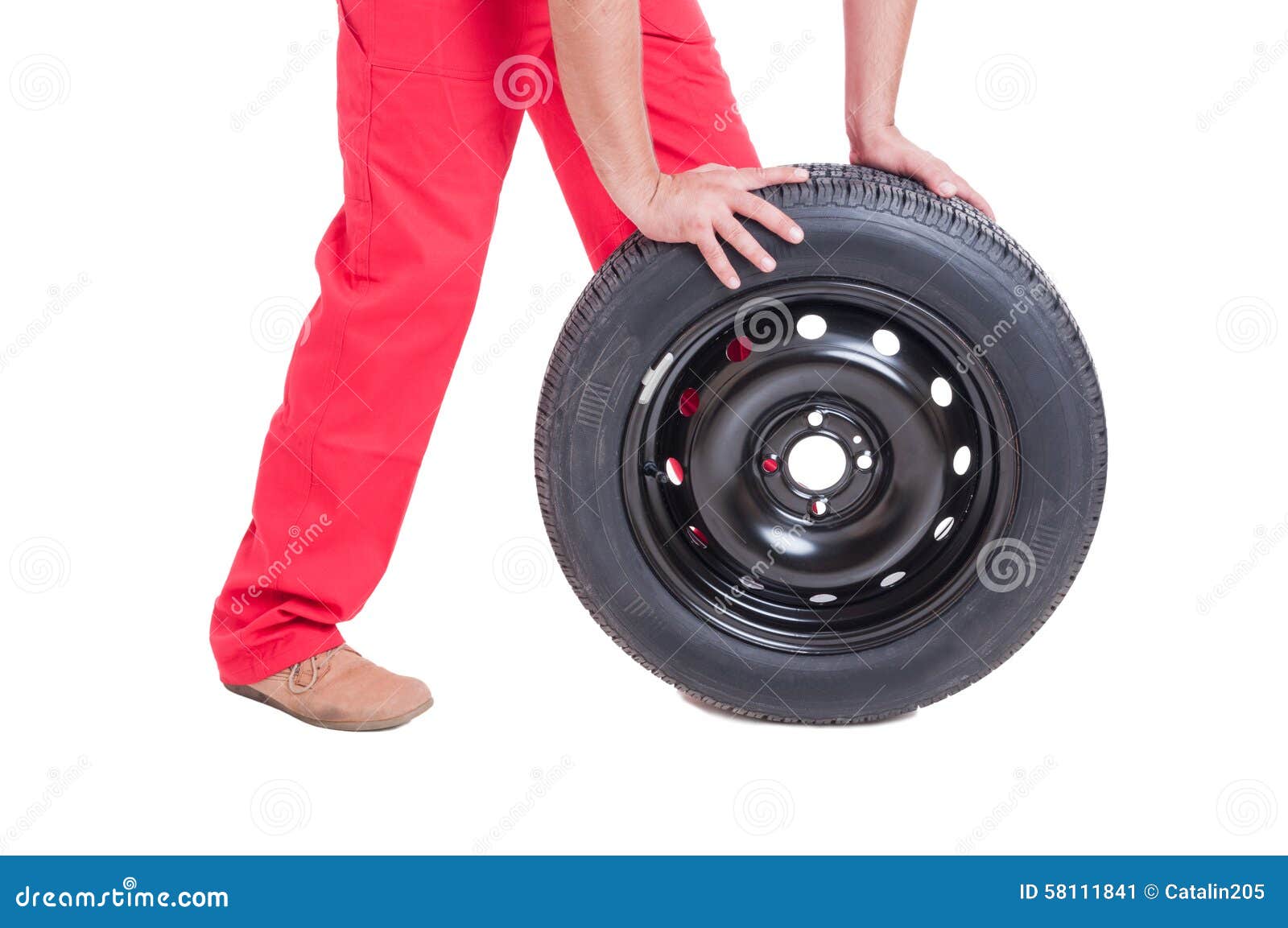 Mechanic Hands Pushing a New Car Wheel Stock Image - Image of ...