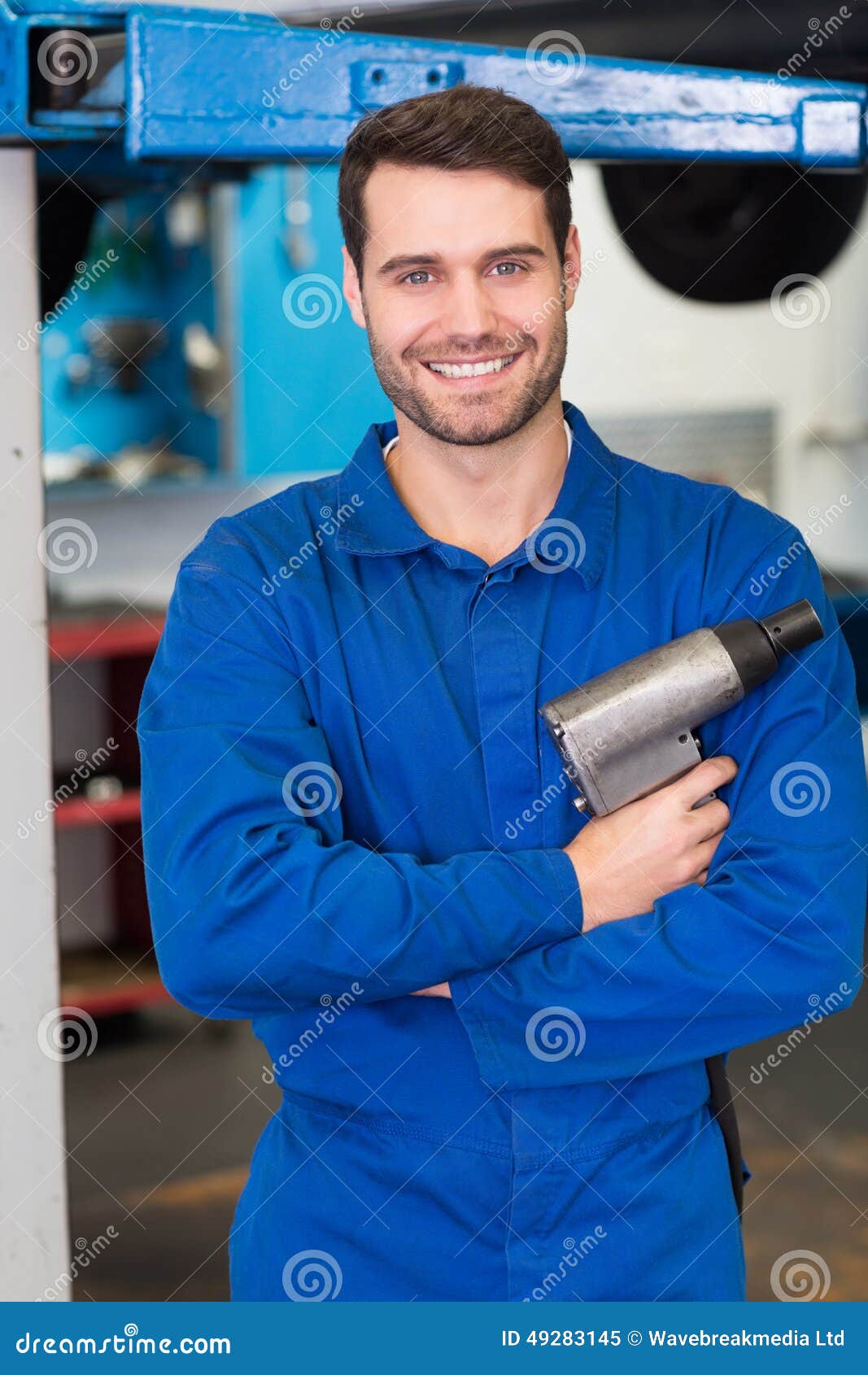 Mechanic Holding a Drill Tool Stock Image - Image of power, automobile ...