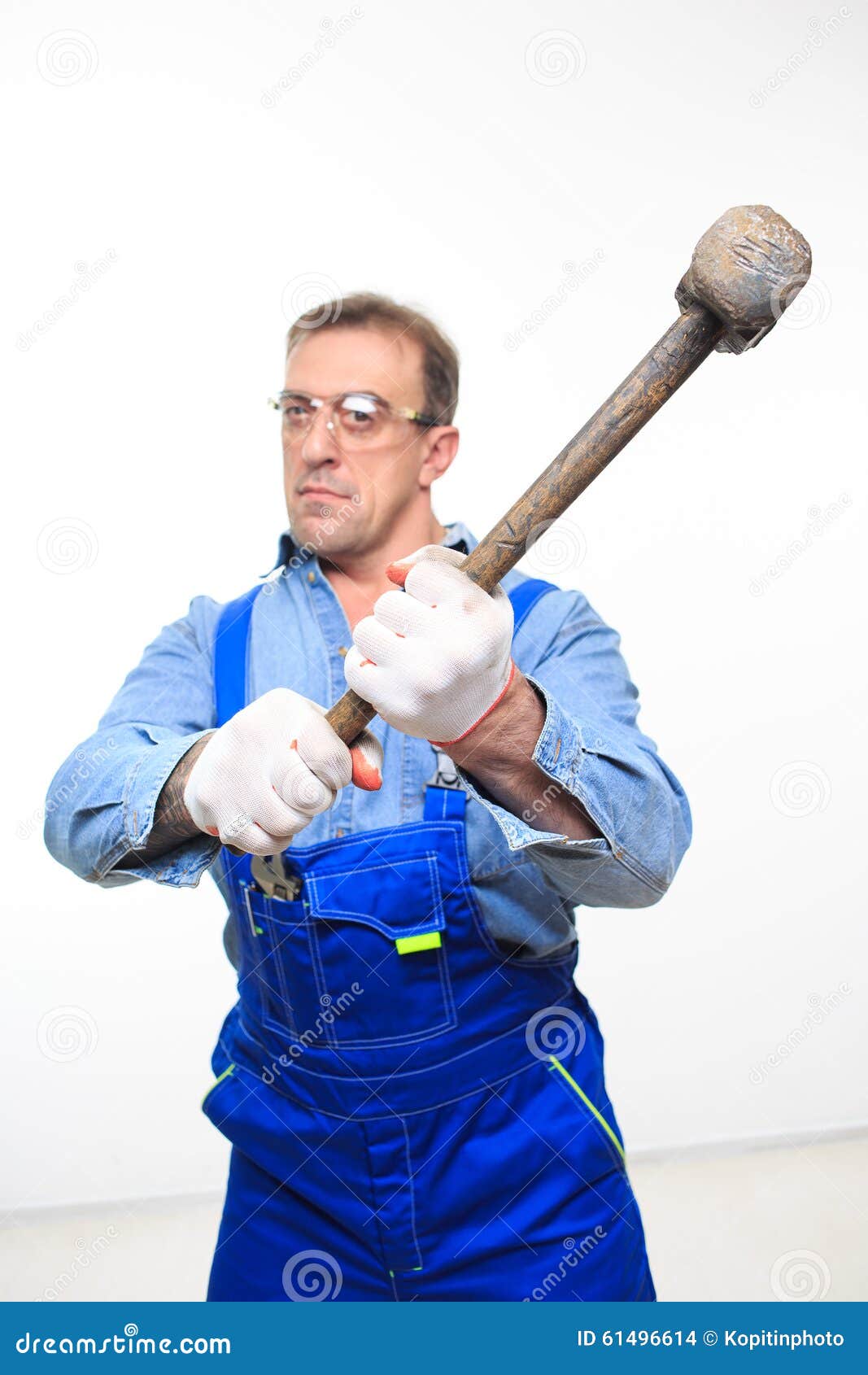Mechanic holding a hammer stock photo. Image of industrial - 61496614