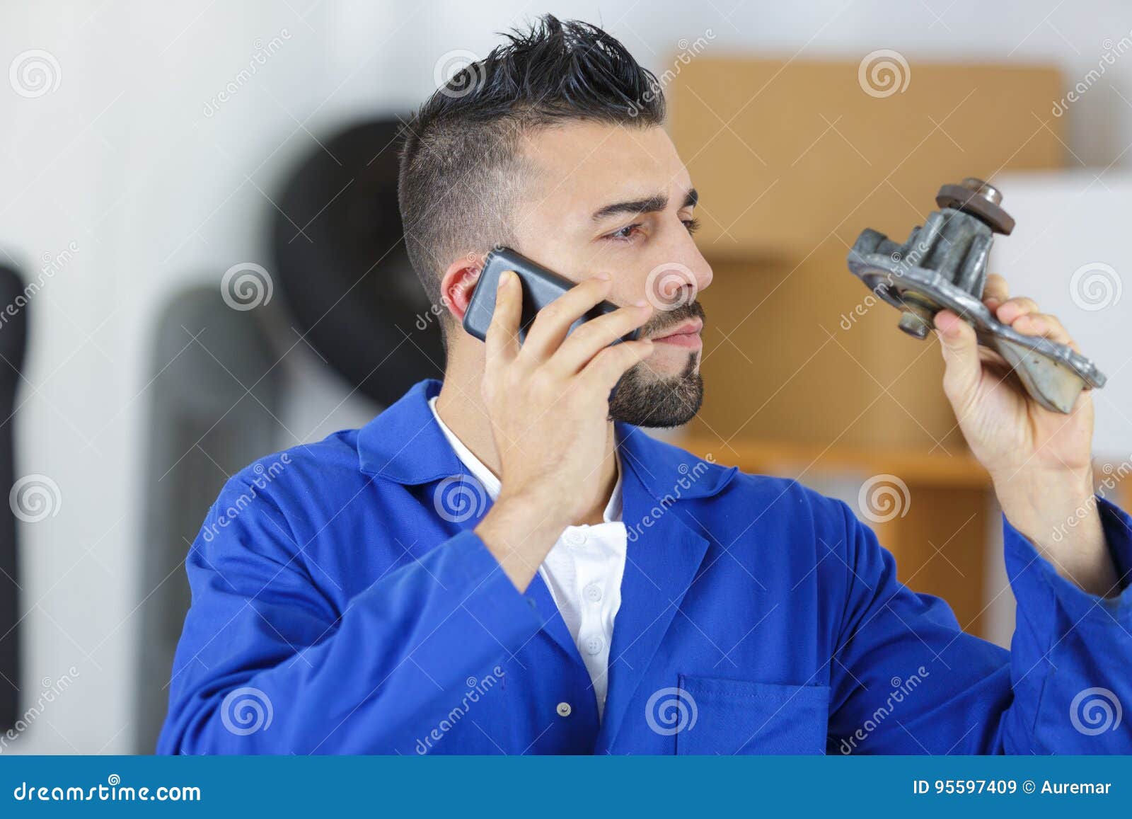 Mechanic Holding Part Calling Factory on Phone Stock Image - Image of ...