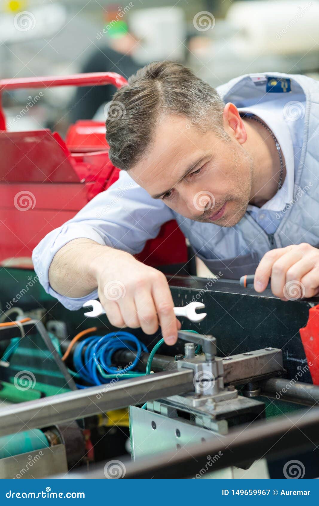 Mechanic Holds Spanner Tool Stock Image - Image of garage, male: 149659967