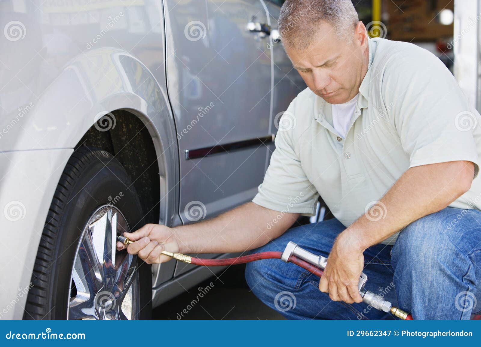 Mechanic Inflating RV~s Tire Stock Image - Image of inflating, people ...