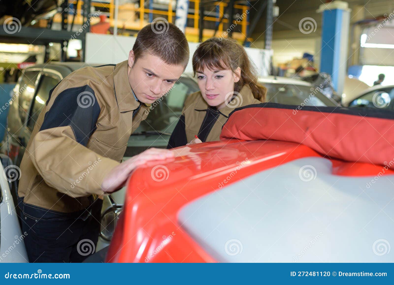 Mechanic Inspecting Vehicle Stock Photo - Image of station, female ...