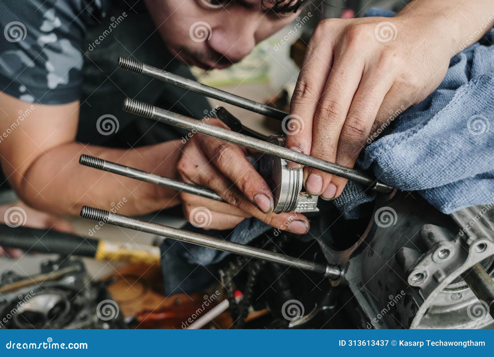 Mechanic is Installing a Motorcycle Piston in Garage.Disassembly and ...