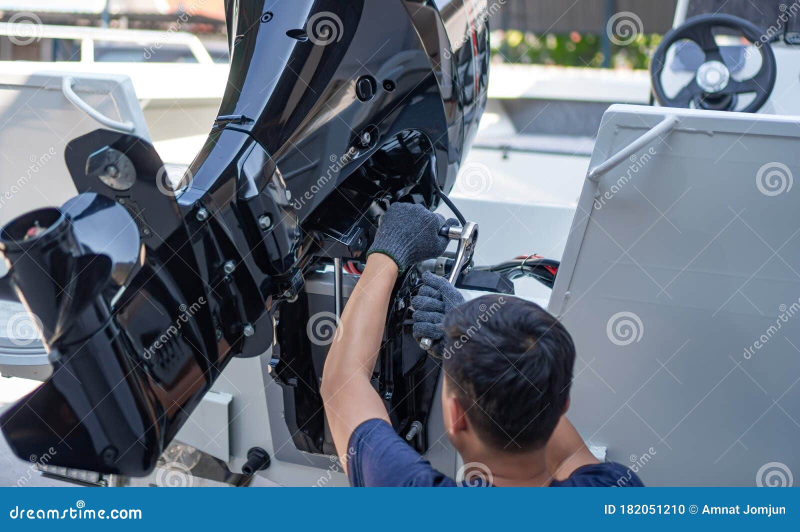 Mechanic is Installing Speed Boat Engine Stock Photo - Image of blue ...